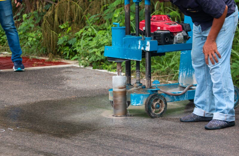 Engineering is Drilling the Road by Road Drilling Machine Stock Image ...