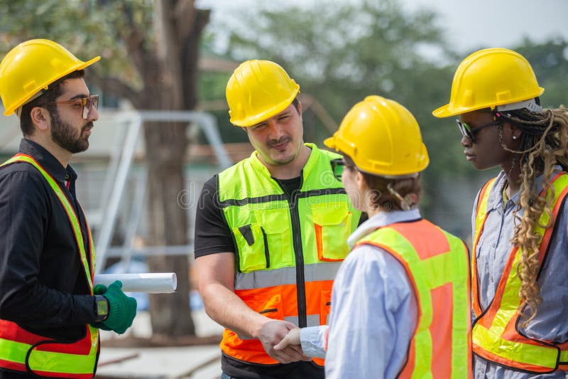 Engineering and Foreman Shaking Hands on Construction Site and Agree ...