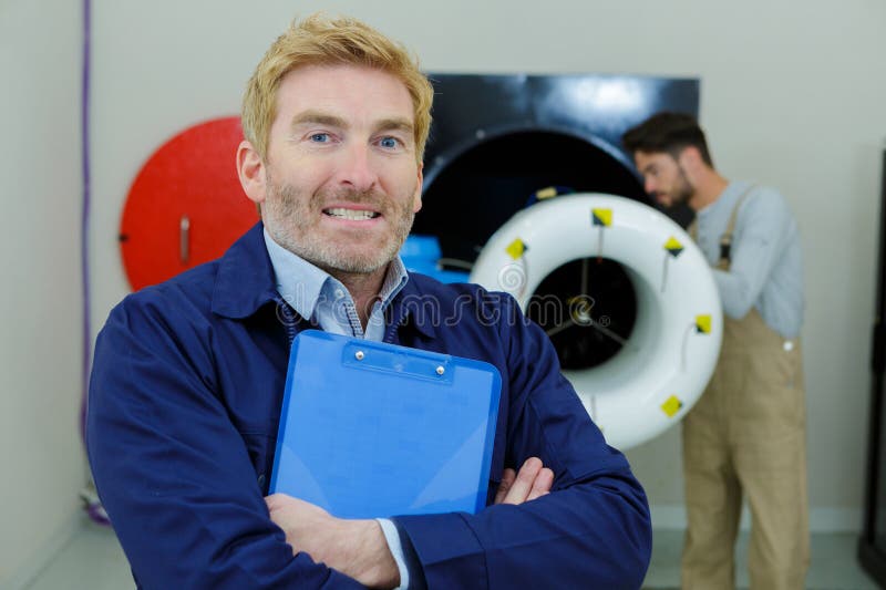 Engineering Man Looking at Camera Stock Photo - Image of logistic ...