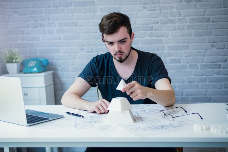Engineering Man Testing Assembly of Pyramid Model 3D Printer Com Stock ...