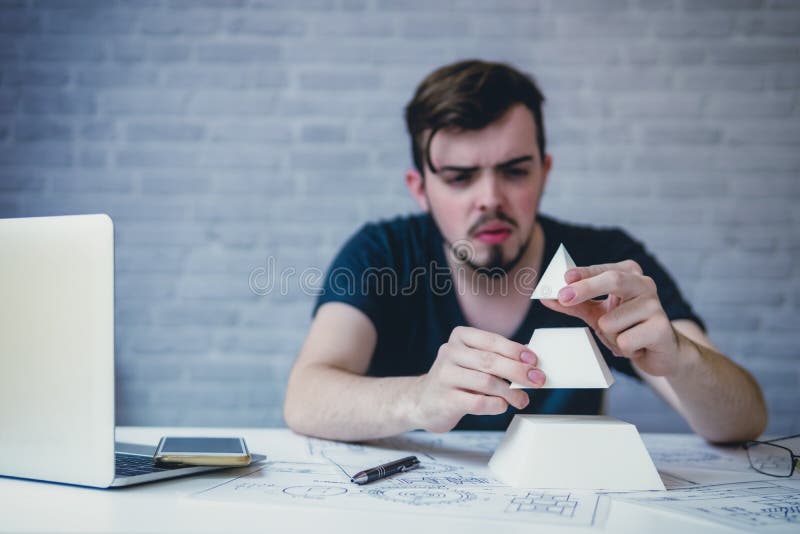 Engineering Man Testing Assembly of Pyramid Model 3D Printer Com Stock ...