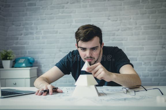 Engineering Man Testing Assembly of Pyramid Model 3D Printer Com Stock ...