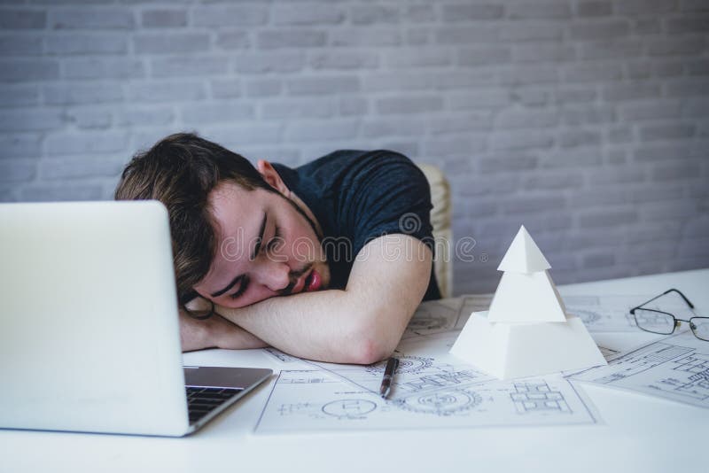 Engineering Man Working on Blueprint for Designing Mechanical Pa Stock ...