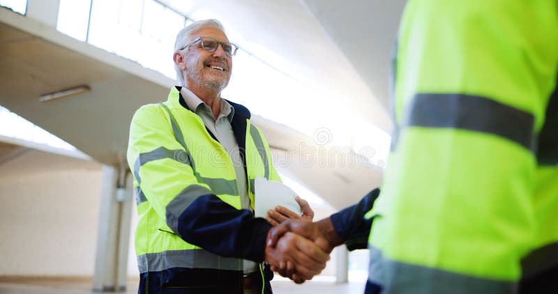 Handshake between Two Construction Workers Stock Photo - Image of ...