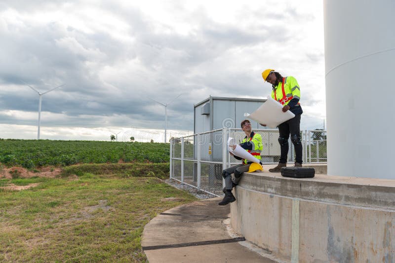 Engineering People are Meeting at Electrical Turbines Field ...