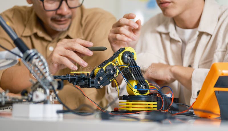 Engineering Robot Technology Asian Programmer Innovation Research Teamwork Coding Development ...