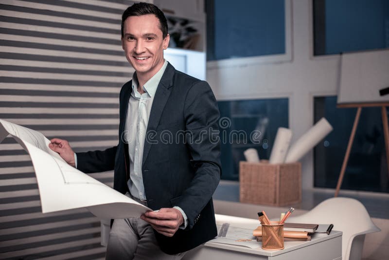 Joyful Delighted Man Looking at the Blueprint Stock Image - Image of ...
