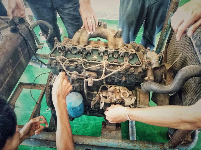 Engineering Student Learning To Disassemble the 4-cylinder Diesel ...