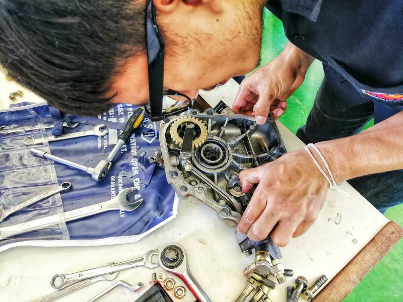 Engineering Student Learning To Disassemble the 4-cylinder Diesel ...