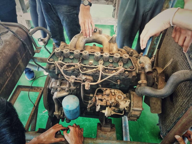 Engineering Student Learning To Disassemble the 4-cylinder Diesel ...
