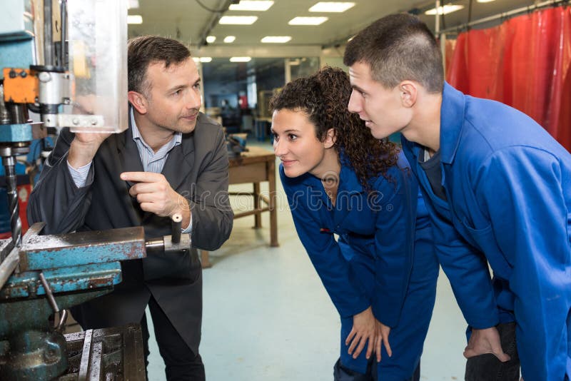 Engineering Student Using Heavy Machinery at University Stock Photo ...