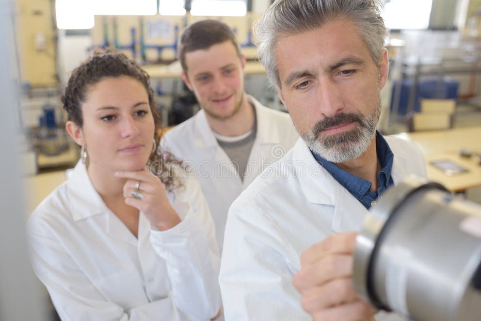 Engineering Students Looking at Teacher Stock Image - Image of posing ...