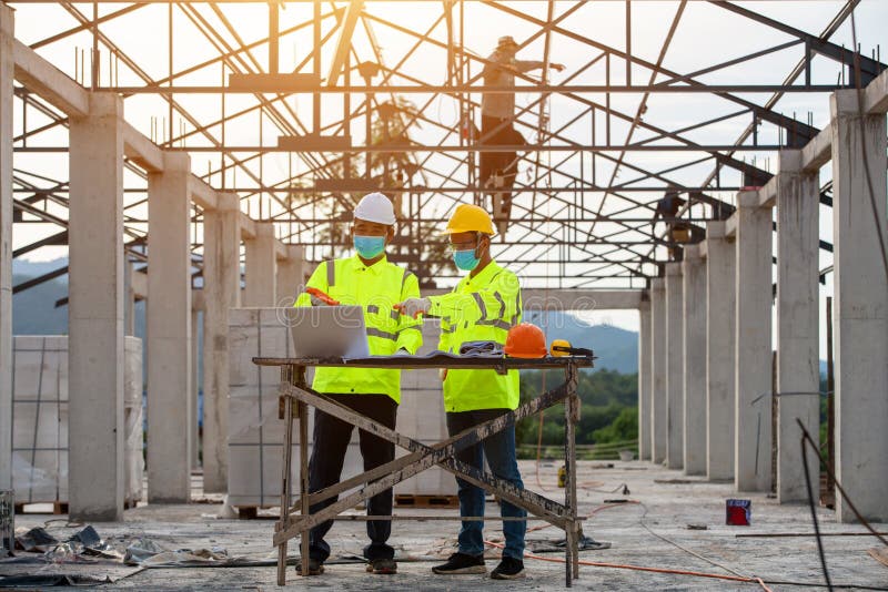 Engineering and Supervisor Working Together in the Construction Site ...