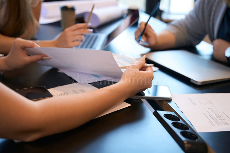 Engineering Team Involved in Construction Cost Estimation Stock Photo ...