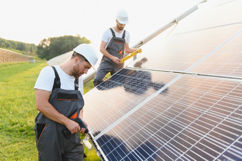 Engineering Team Working on Checking and Maintenance in Solar Power ...