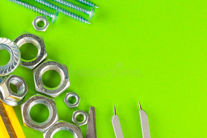 Engineering Tools. Bolts and Nuts on Green Background Stock Image ...