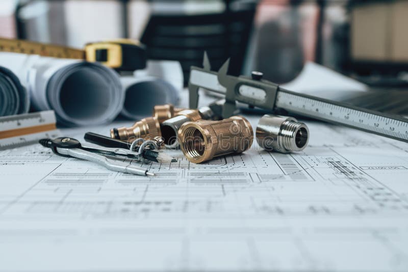 Engineering Working with Drawings Inspection on the Office Desk and ...