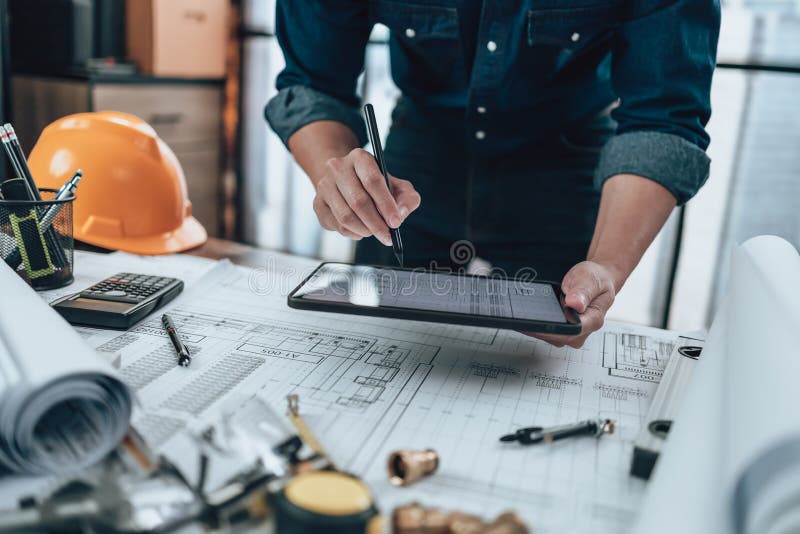 Engineering Working with Drawings Inspection on Tablet in the Office ...