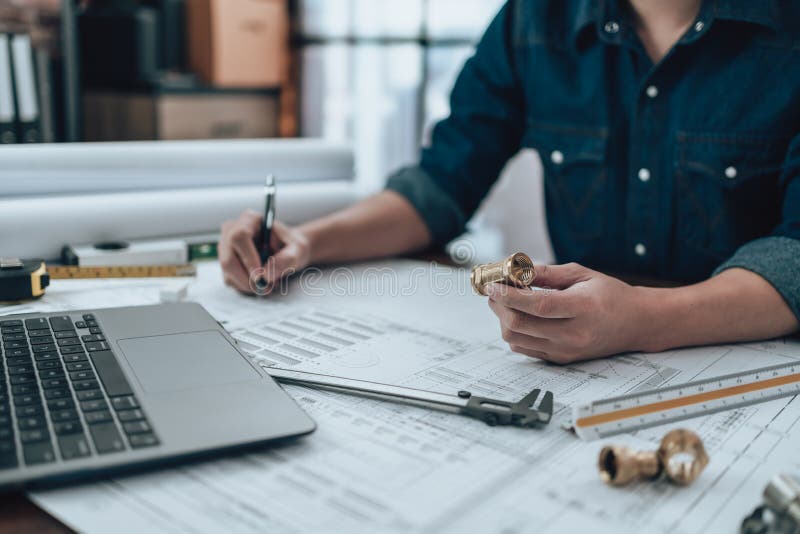 Engineering Working with Drawings Inspection and Writing on the Office ...