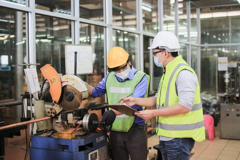 Engineering Working in Factory Concept.Two Engineer Worker Working ...