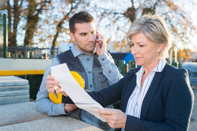 Engineers and Architect Working Outside Construction Site Stock Image ...