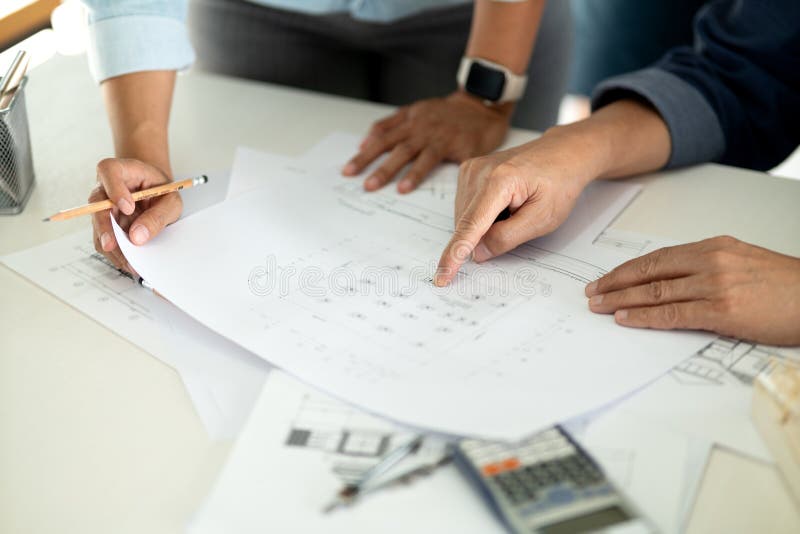 Engineers and Architects are Looking at the Plans of the Construction ...