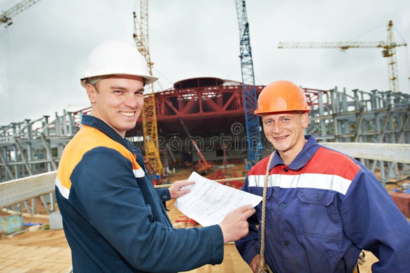 Engineers Builders at Construction Site Stock Image - Image of plan ...