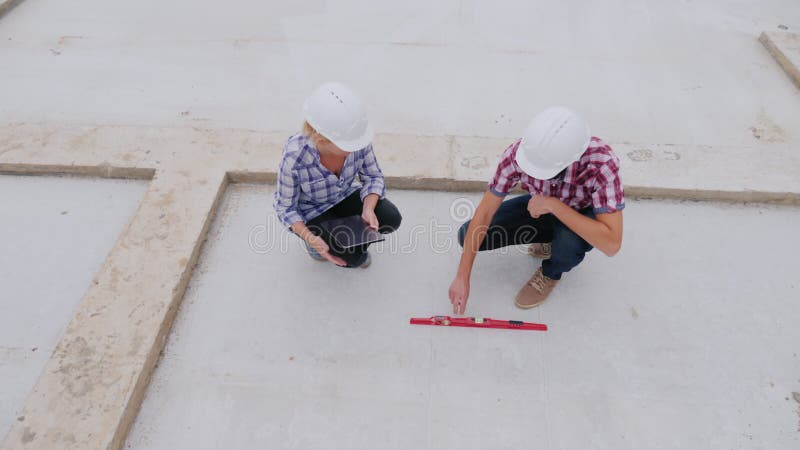 Engineers Check the Accuracy of Building Construction. Use the Level ...