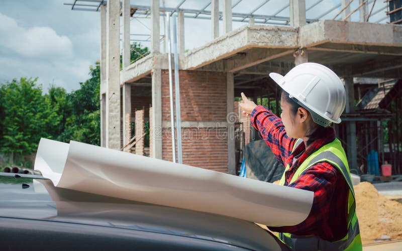 Engineers Checking Blueprint and Planning Project Working Outdoors ...