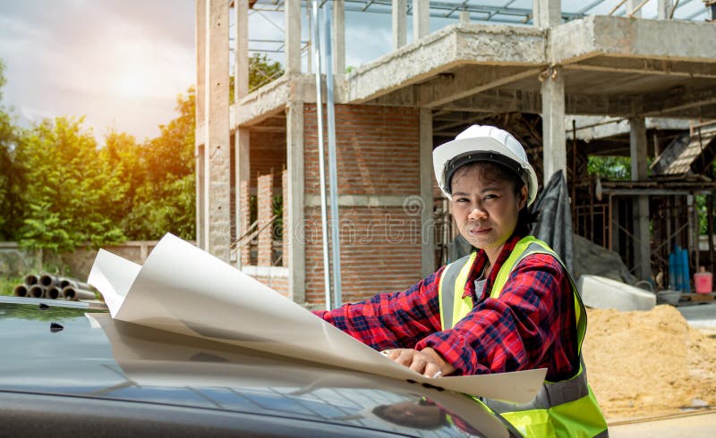 Engineers Checking Blueprint and Planning Project Working Outdoors ...