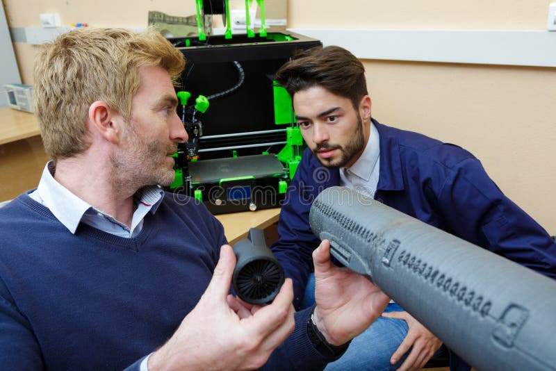 2 Engineers Checking Pipe Indoors Stock Photo - Image of industrial ...
