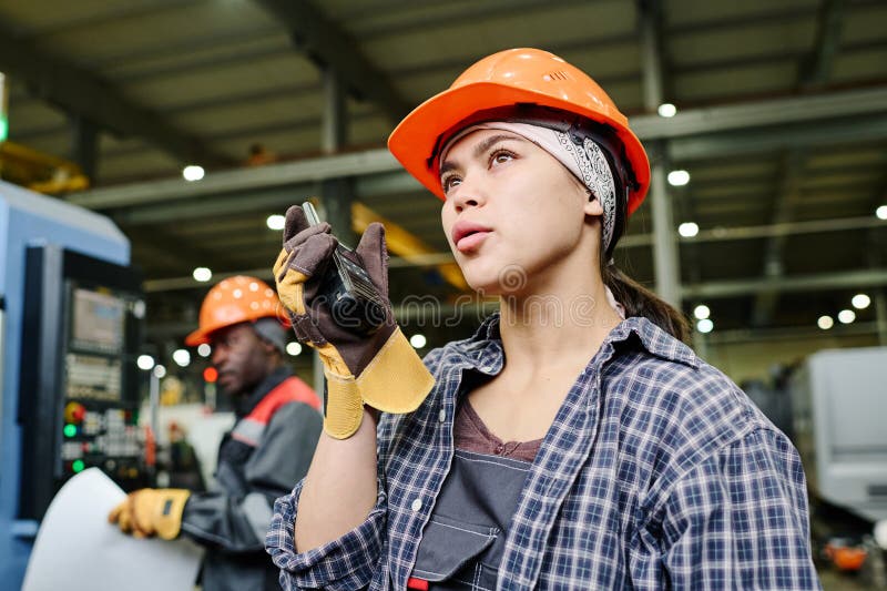 Engineers Collaborating at Industrial Facility Stock Image - Image of ...