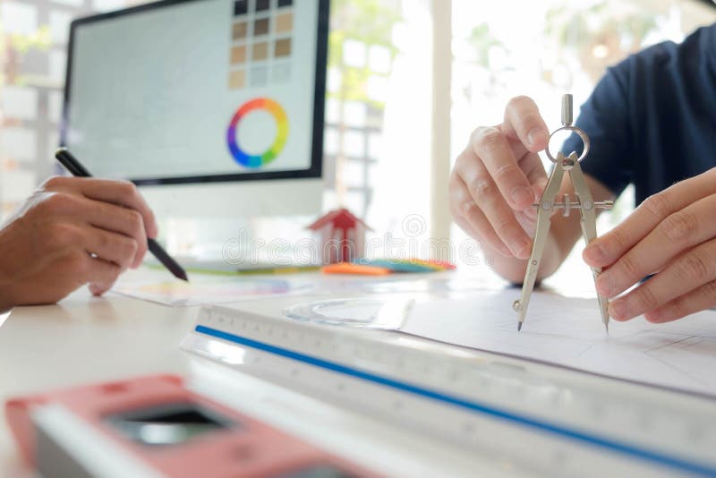 Engineers and Creative Artists Work on Table, Work, Consult, Advise on ...