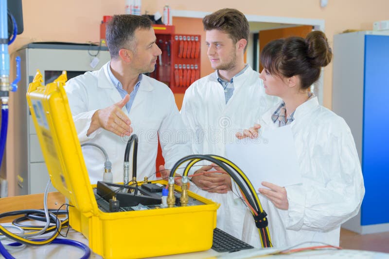 Engineers Deliberating Project Stock Photos - Free & Royalty-Free Stock ...