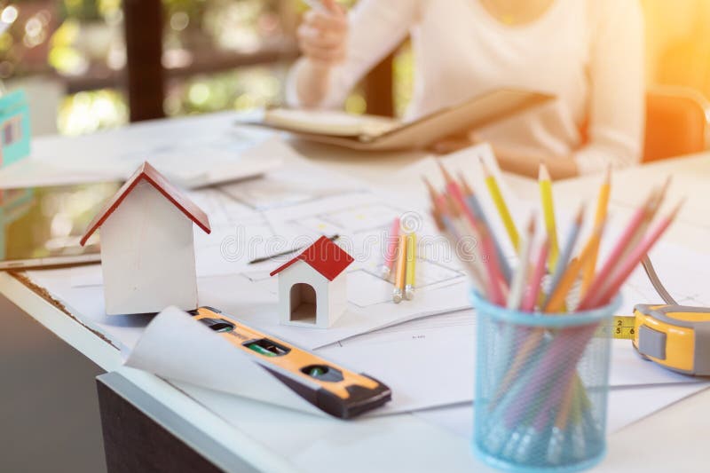 Engineers and Designers are Discussing the Layout of the House and the ...