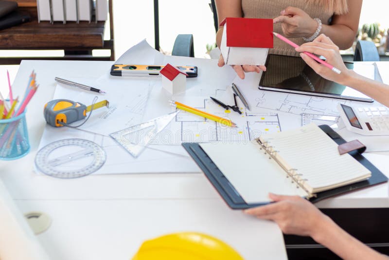 Engineers and Designers are Discussing the Layout of the House and the ...