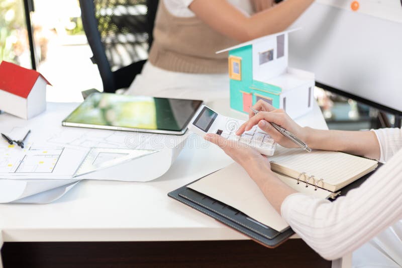 Engineers and Designers are Discussing the Layout of the House and the ...