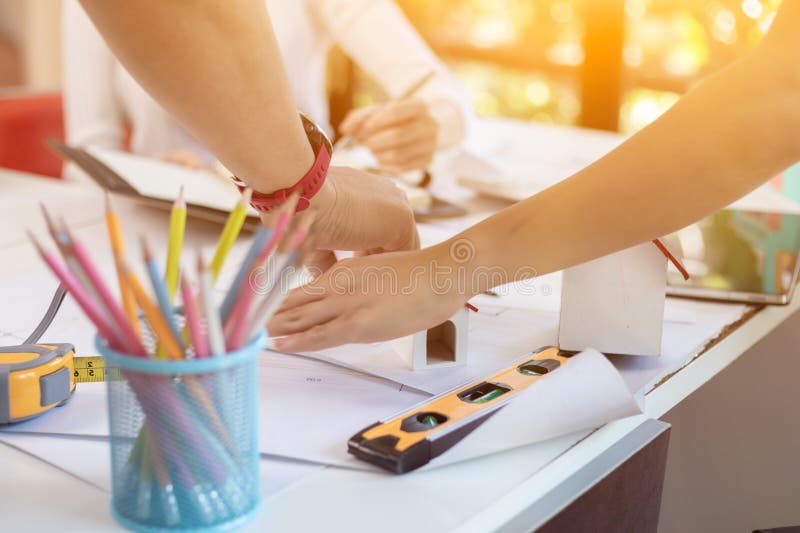 Engineers and Designers are Discussing the Layout of the House and the ...