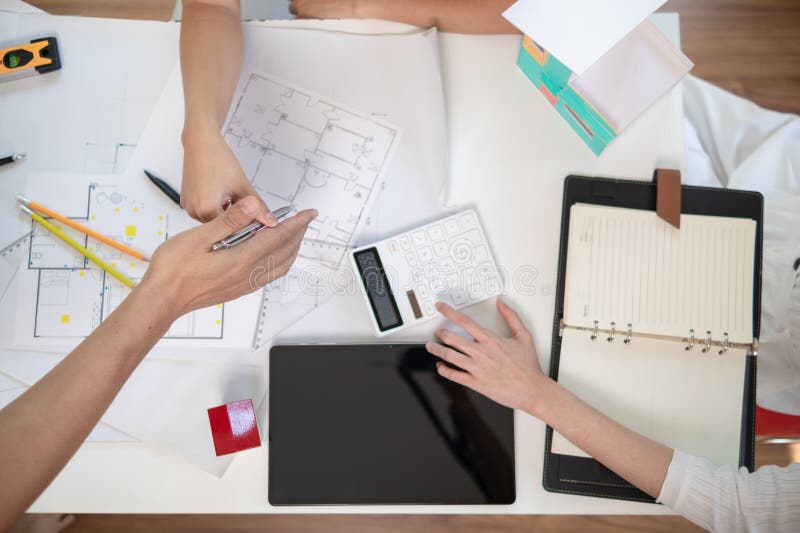 Engineers and Designers are Discussing the Layout of the House and the ...