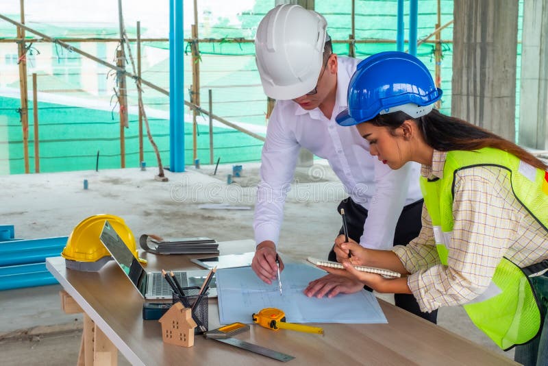 Engineers are Discussing at Building Site Stock Image - Image of ...