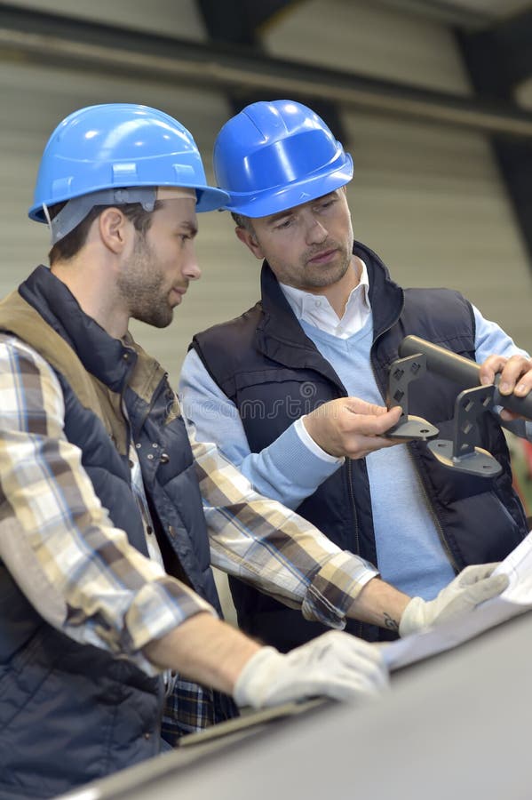 Engineers Discussing Quality Products Stock Photo - Image of engineers ...