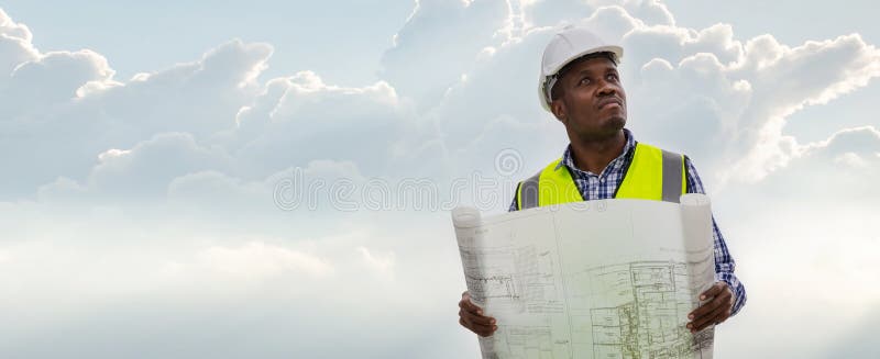 Engineers with Draft Plan of Building on Constructing Site. Engineer ...