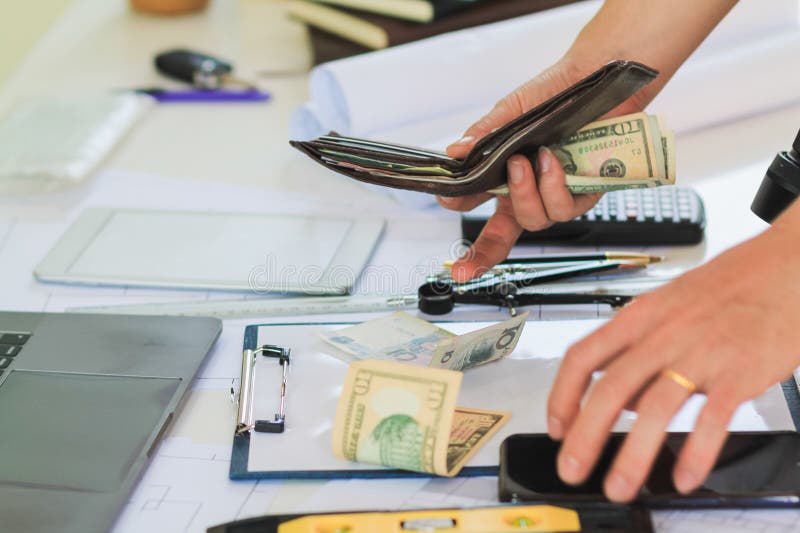 Engineers and Foreman are Calculating Workers Expenses and Overtime To ...