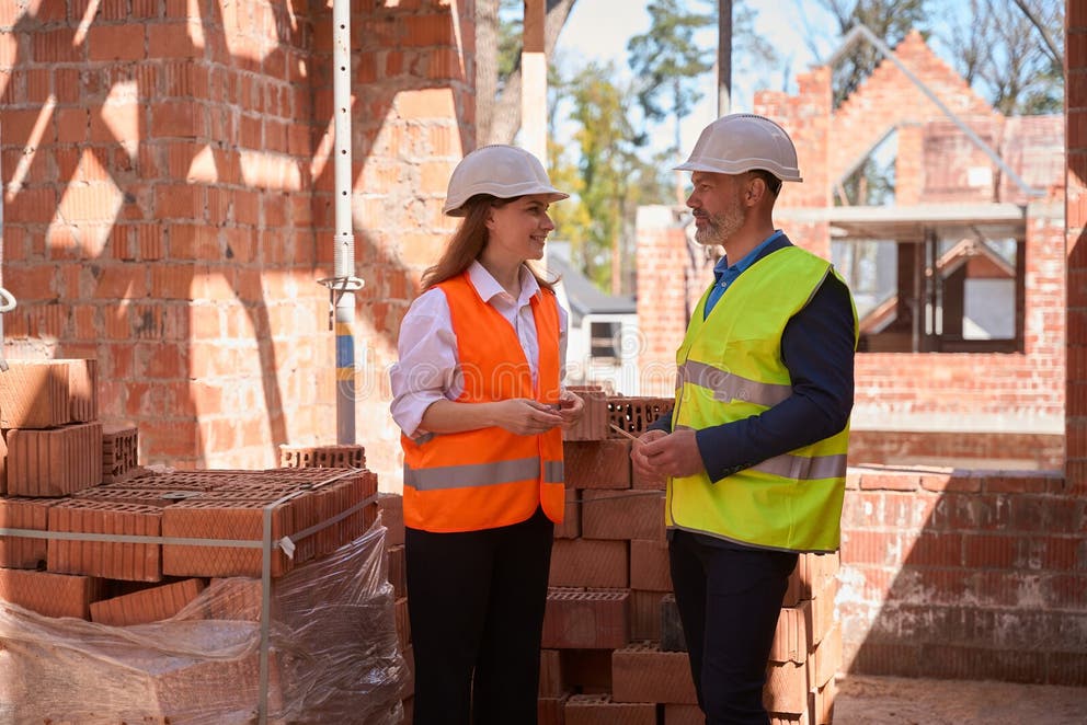 Engineers in Hardhats Counting Received Bricks and Discussing Building ...
