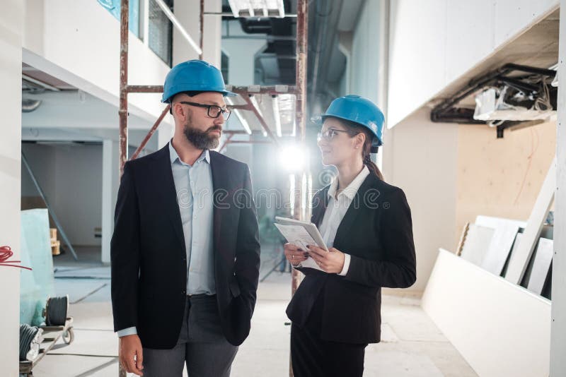 Engineers in Hardhats Have Conversation Stock Photo - Image of ...