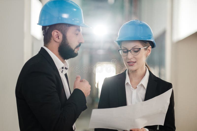 Engineers in Hardhats Have Conversation Stock Image - Image of ...