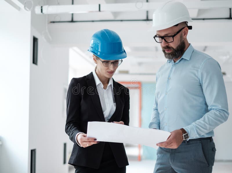 Engineers in Hardhats Have Conversation Stock Photo - Image of ...