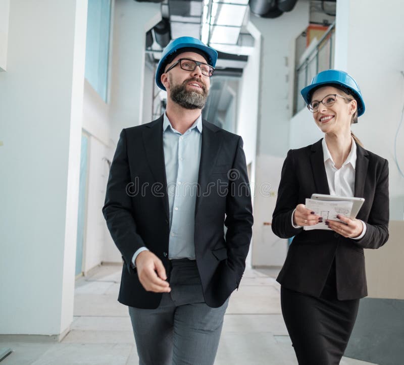 Engineers in Hardhats Have Conversation Stock Photo - Image of ...