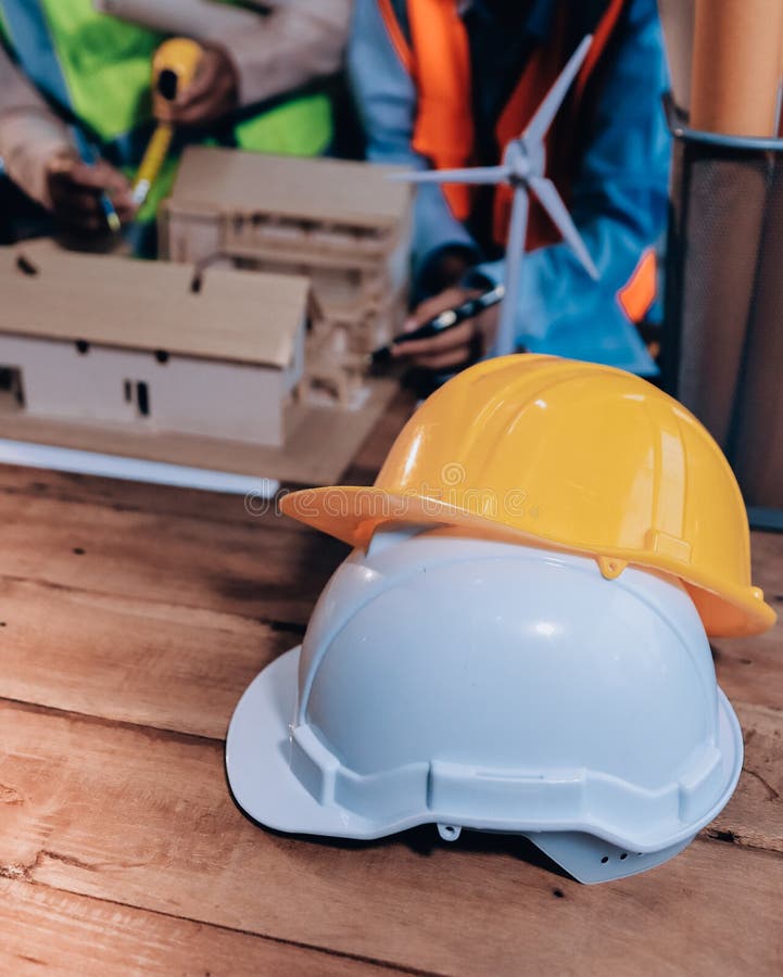 Engineers are Helping To Design Work on Blueprints and Collaborate on ...