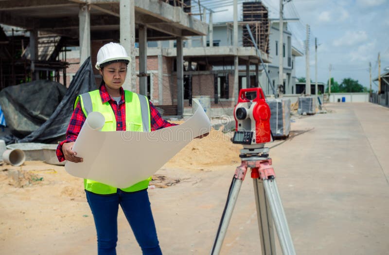 Engineers Holding Blueprint Project Working Outdoors Building Side with ...